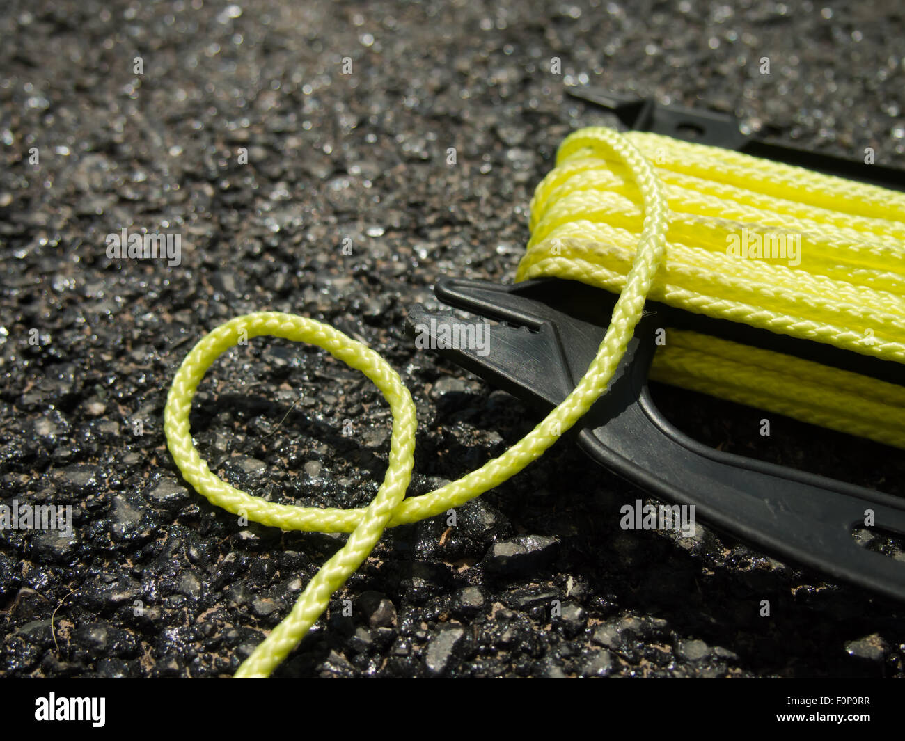 The Yellow String on the Ground at the Constructionsite Stock Photo - Alamy