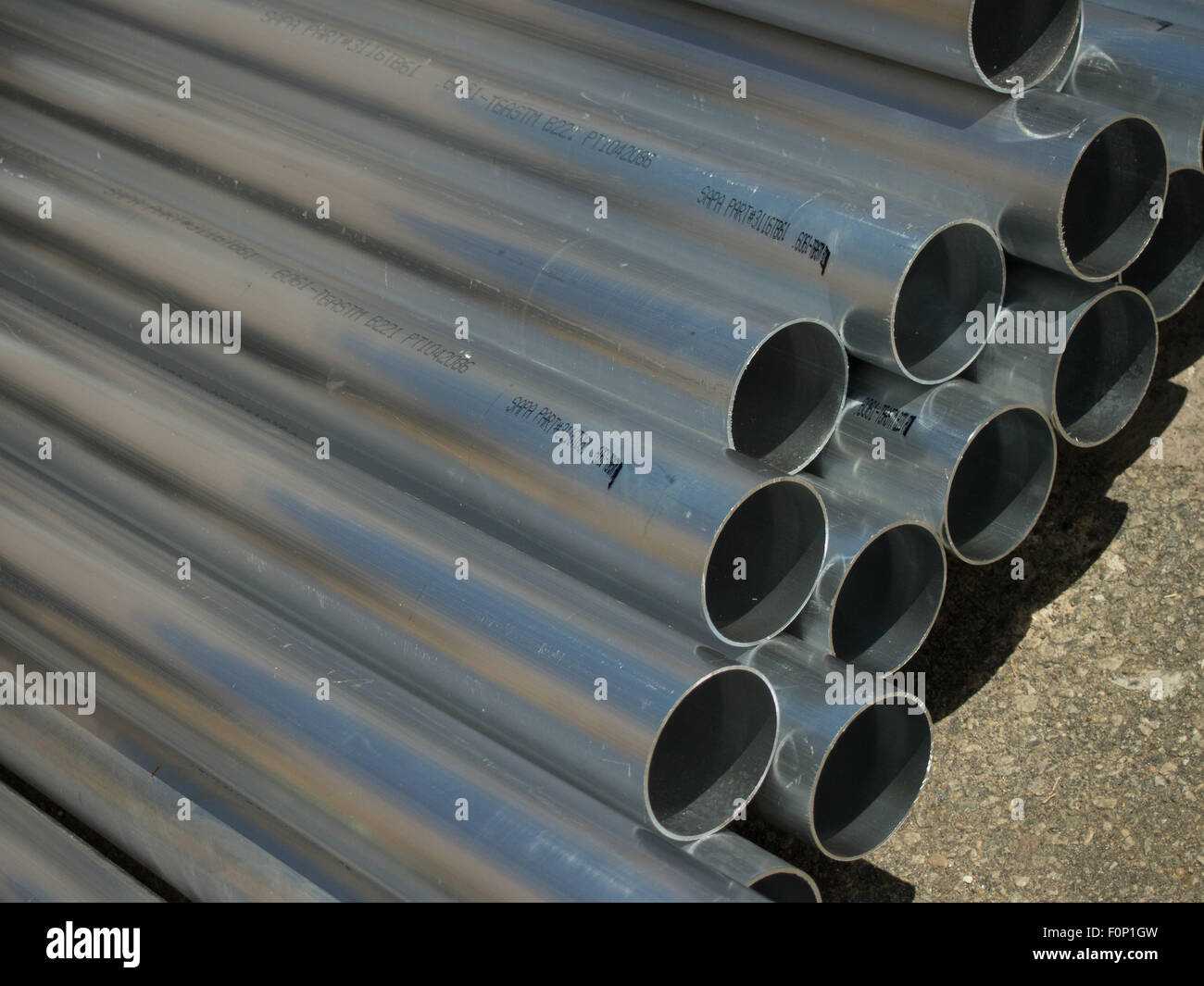 Stack of Many Pipes at the Construction Site Stock Photo - Alamy