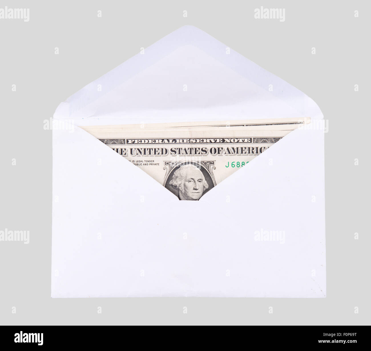 dollar notes in envelope on white background Stock Photo - Alamy
