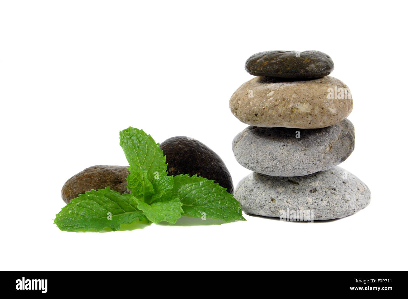 Zen stones and mint leaves isolated on white Stock Photo - Alamy