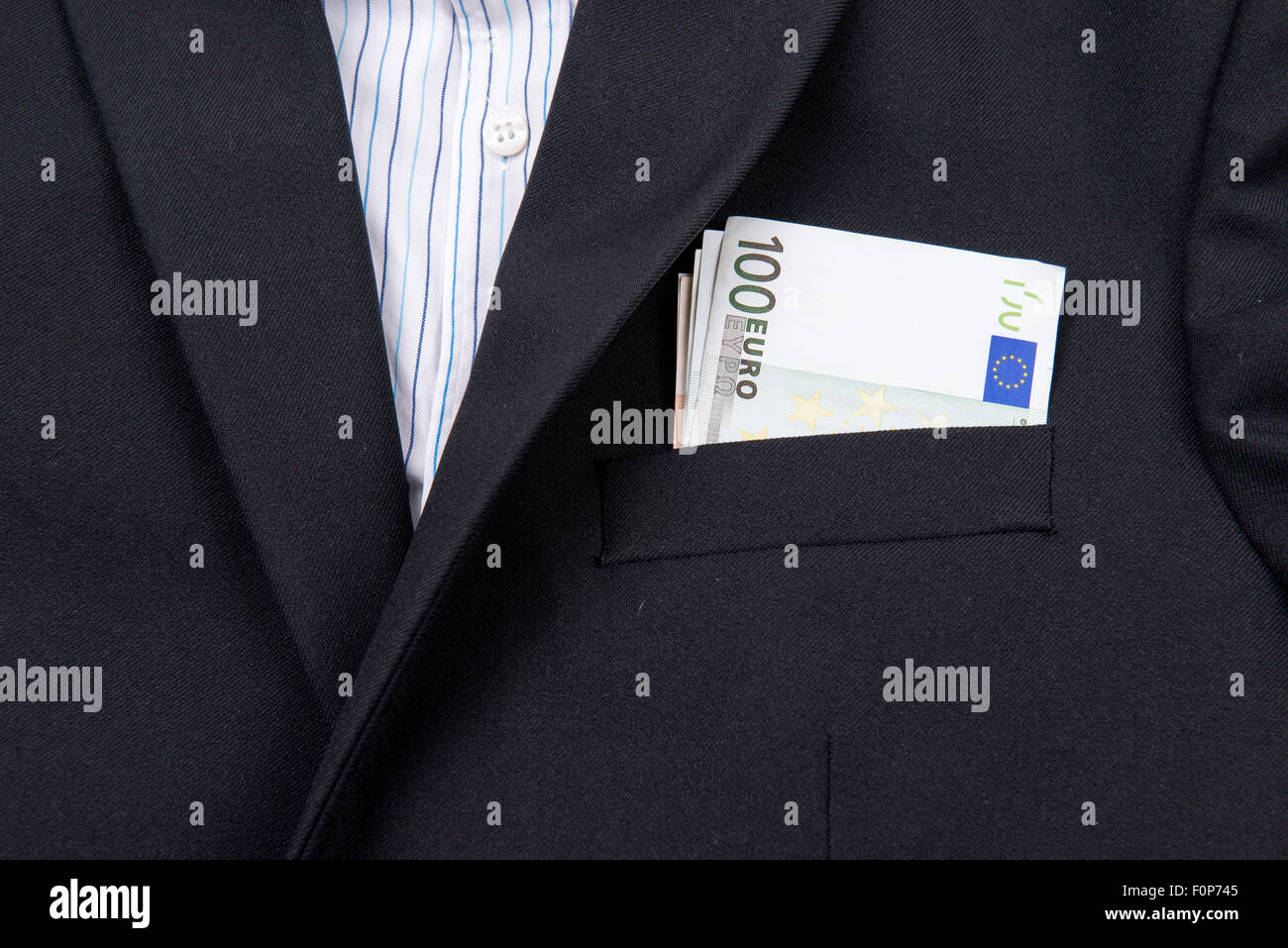 euro notes in suit pocket Stock Photo - Alamy