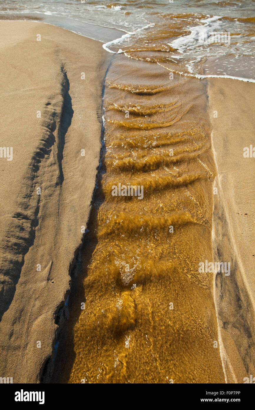 Water flowing down channel in sand, Dail Beag Beach, Lewis, Outer ...