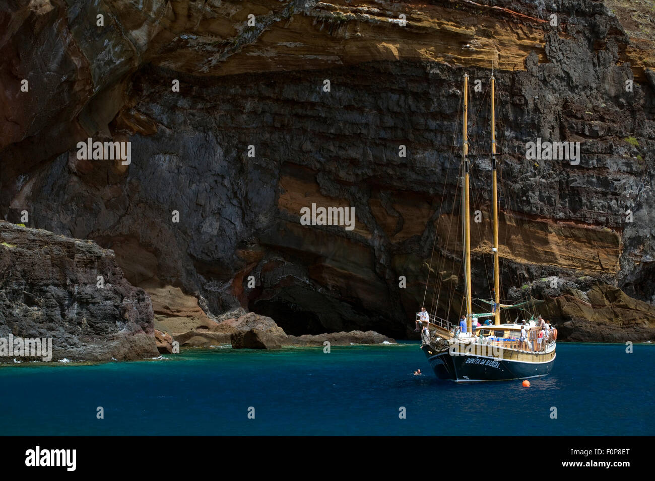Boat just off the Deserta Grande coast, Desertas Islands, Madeira ...