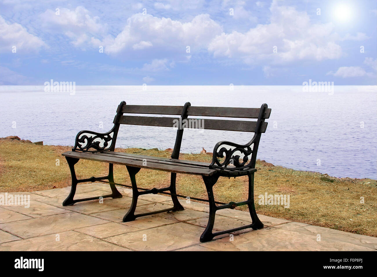 Bench on the water front Stock Photo - Alamy