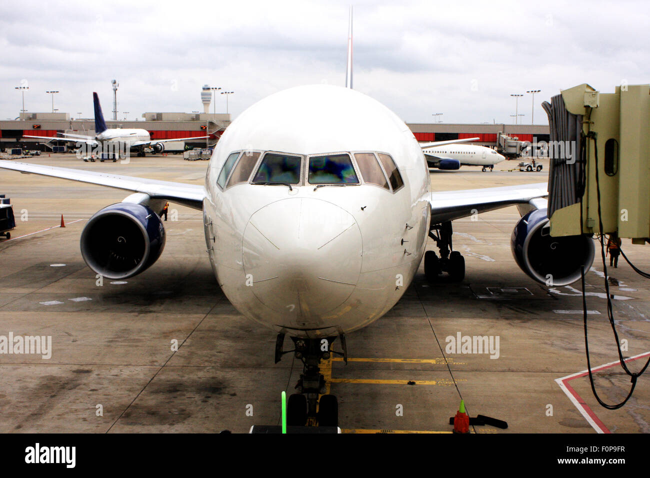 Parked airliner at a huge airport Stock Photo - Alamy