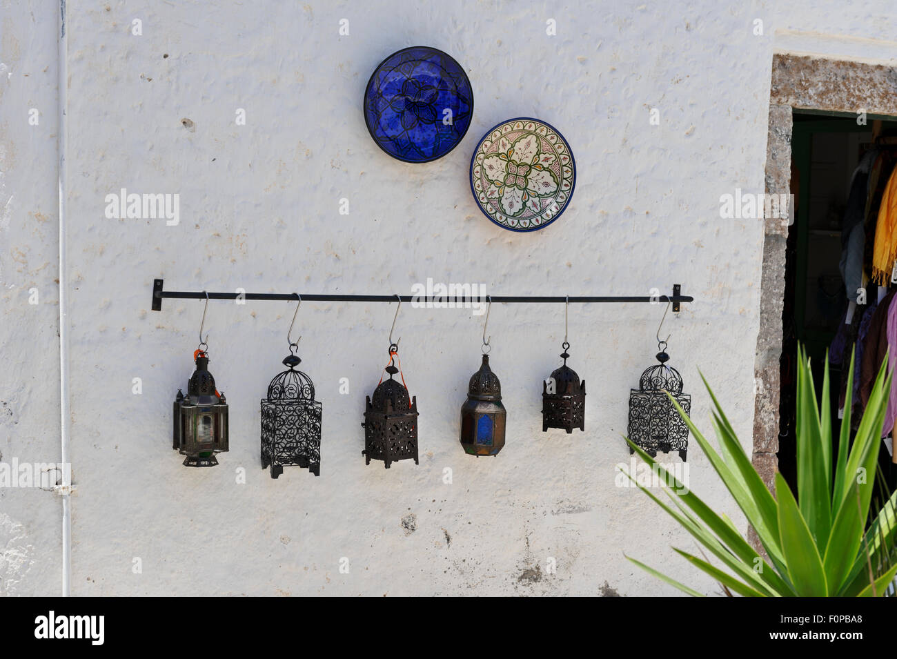 A series of old lanterns hanging on a wall, Santorini, Greece Stock ...