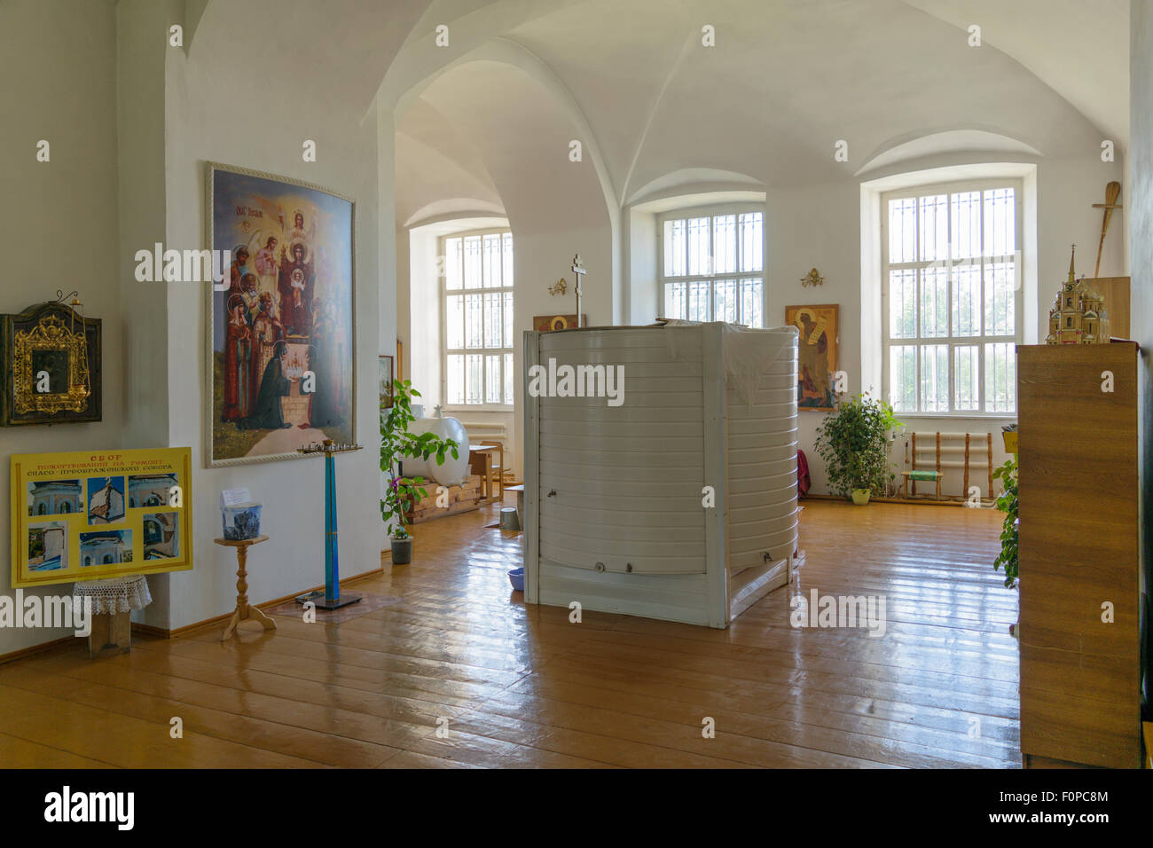 Large cylindrical container for holy water into the interior of the ...
