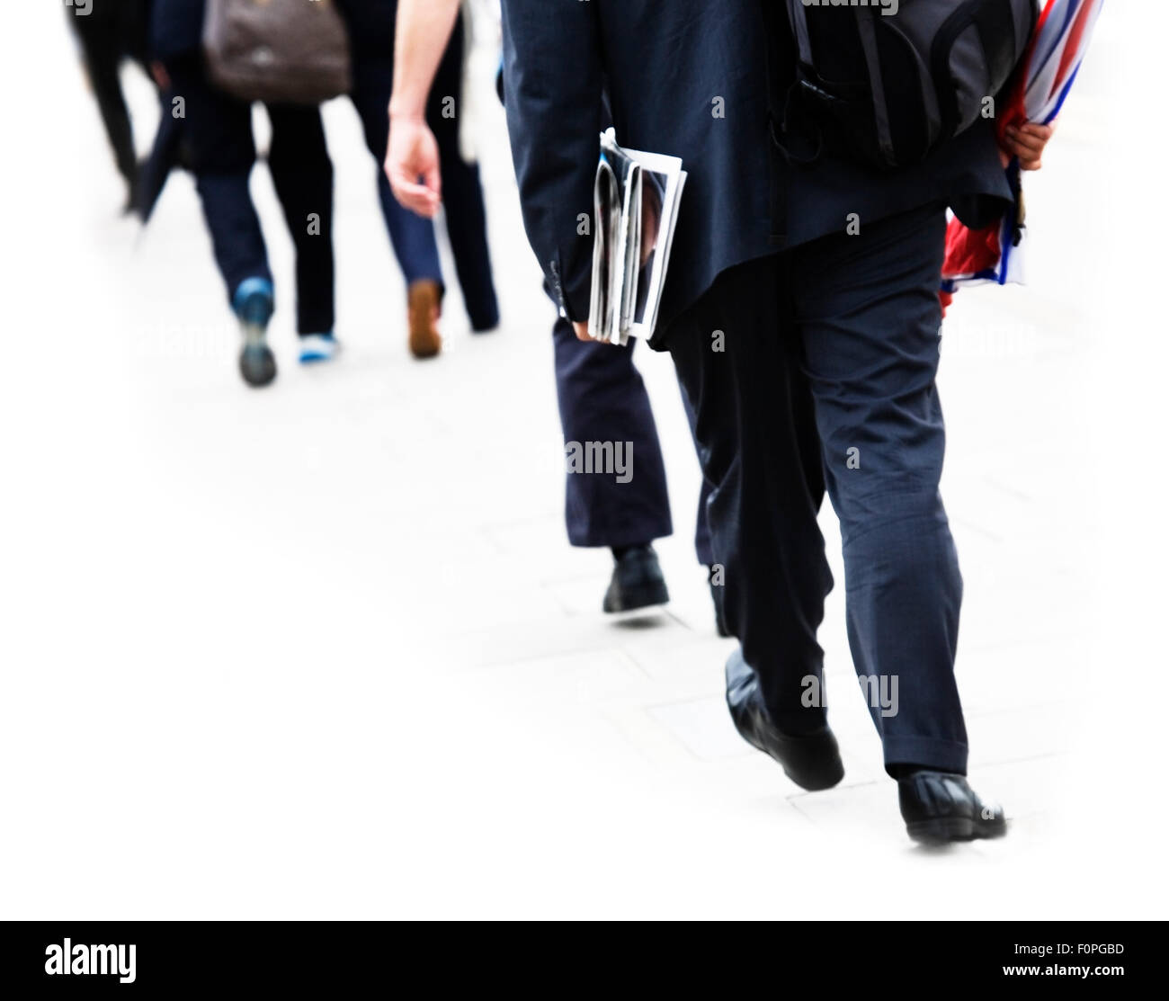Commuters walk to work. Viewed from behind and isolated on white ...