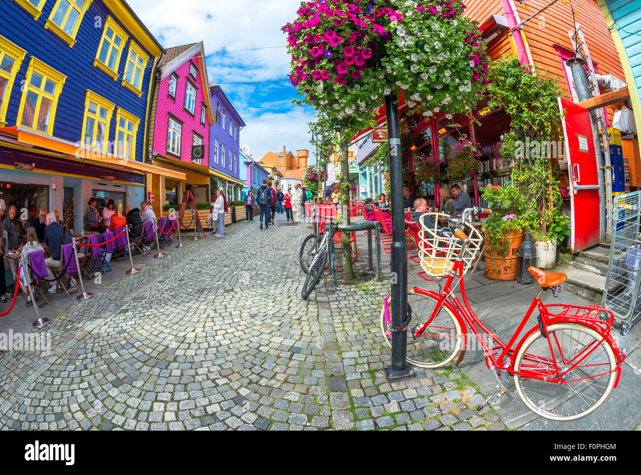 Colourful painted shop fronts along Øvre Holmegate, Stavanger, Norway ...