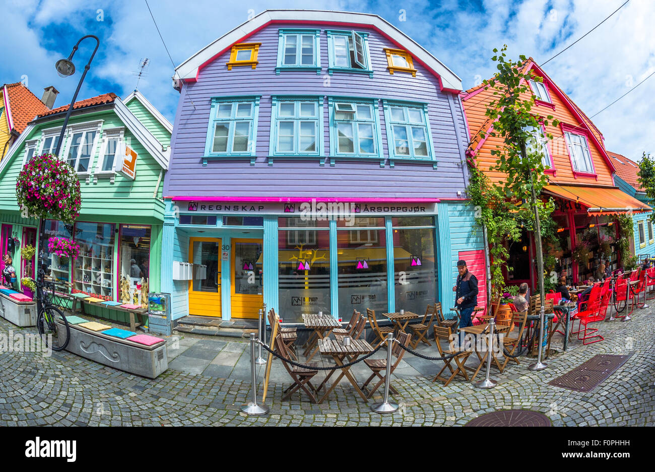 Colourful painted shop fronts along Øvre Holmegate, Stavanger, Norway ...