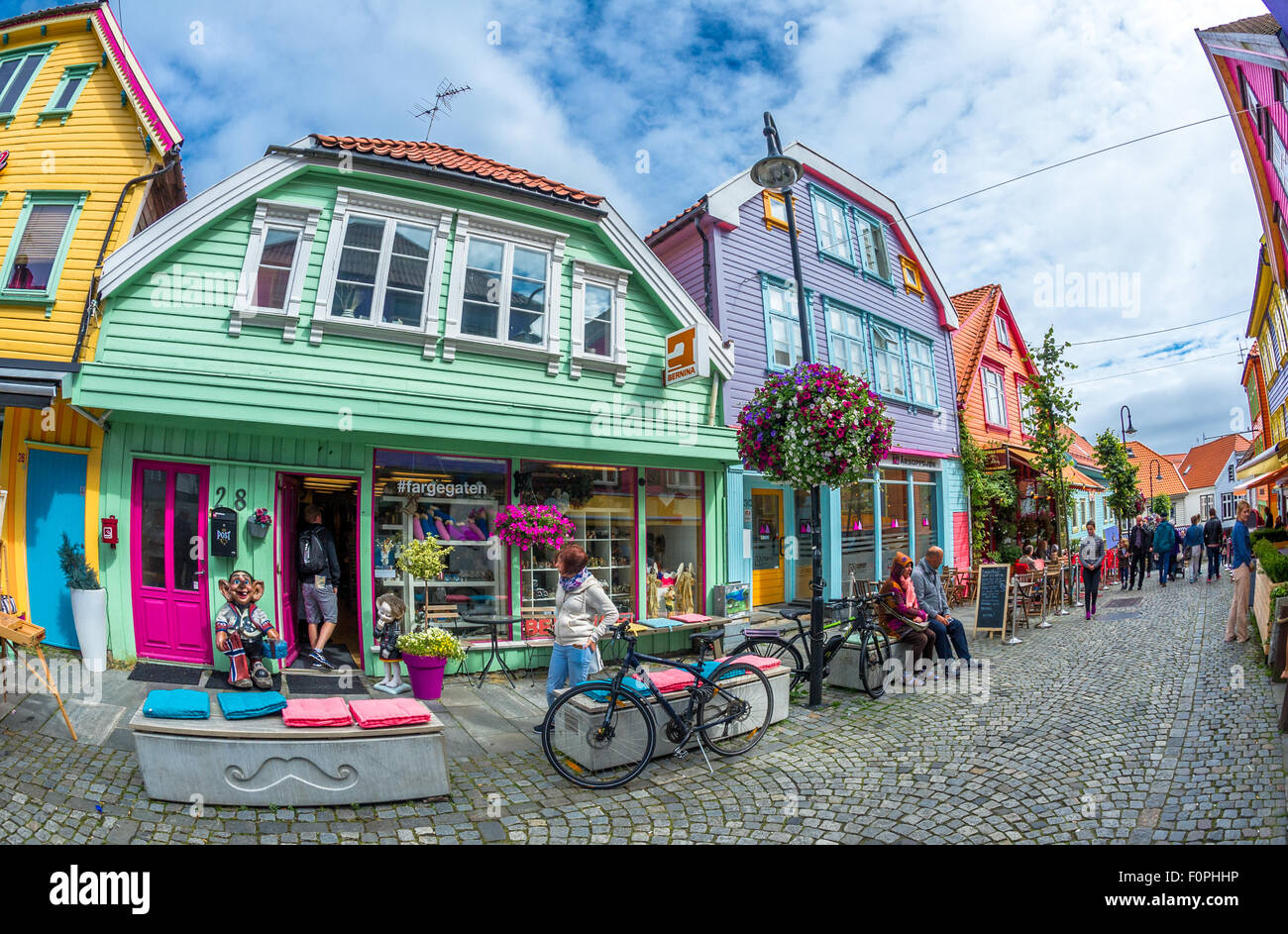 Colourful painted shop fronts along Øvre Holmegate, Stavanger, Norway ...