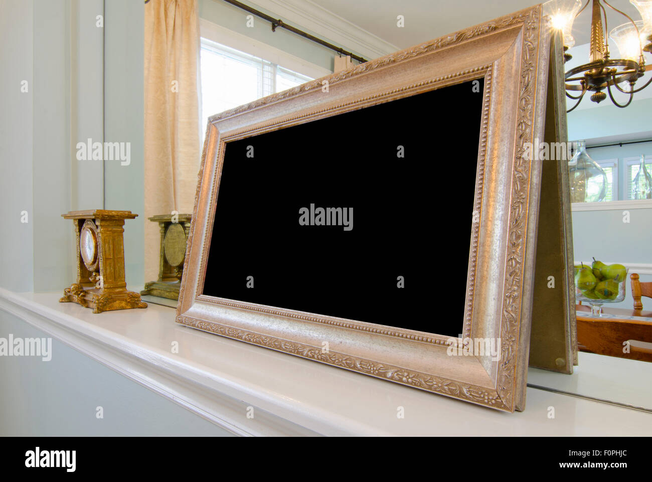 Picture Frame on Mantle Stock Photo - Alamy