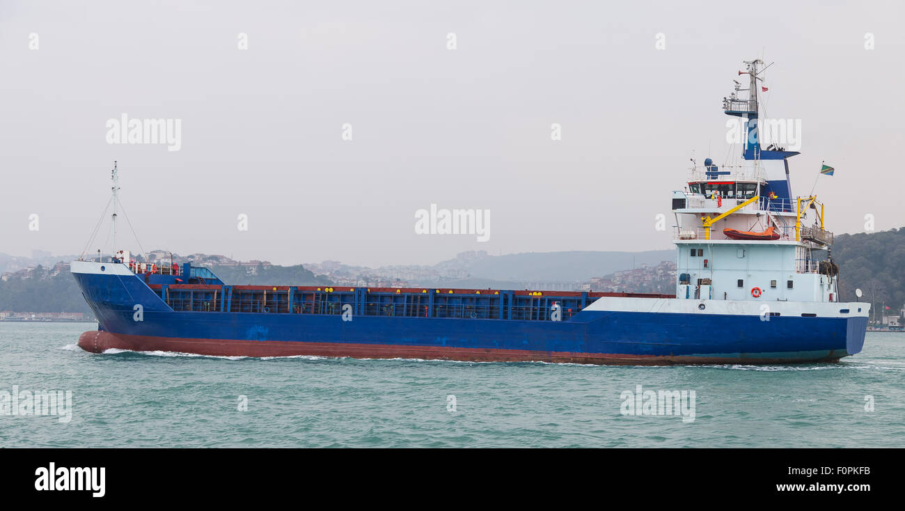 A cargo ship carrying goods between ports Stock Photo - Alamy