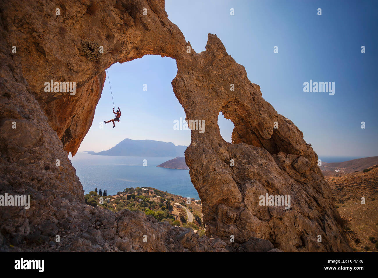 Rock climber falling of a cliff while lead climbing. Kalymnos Island ...
