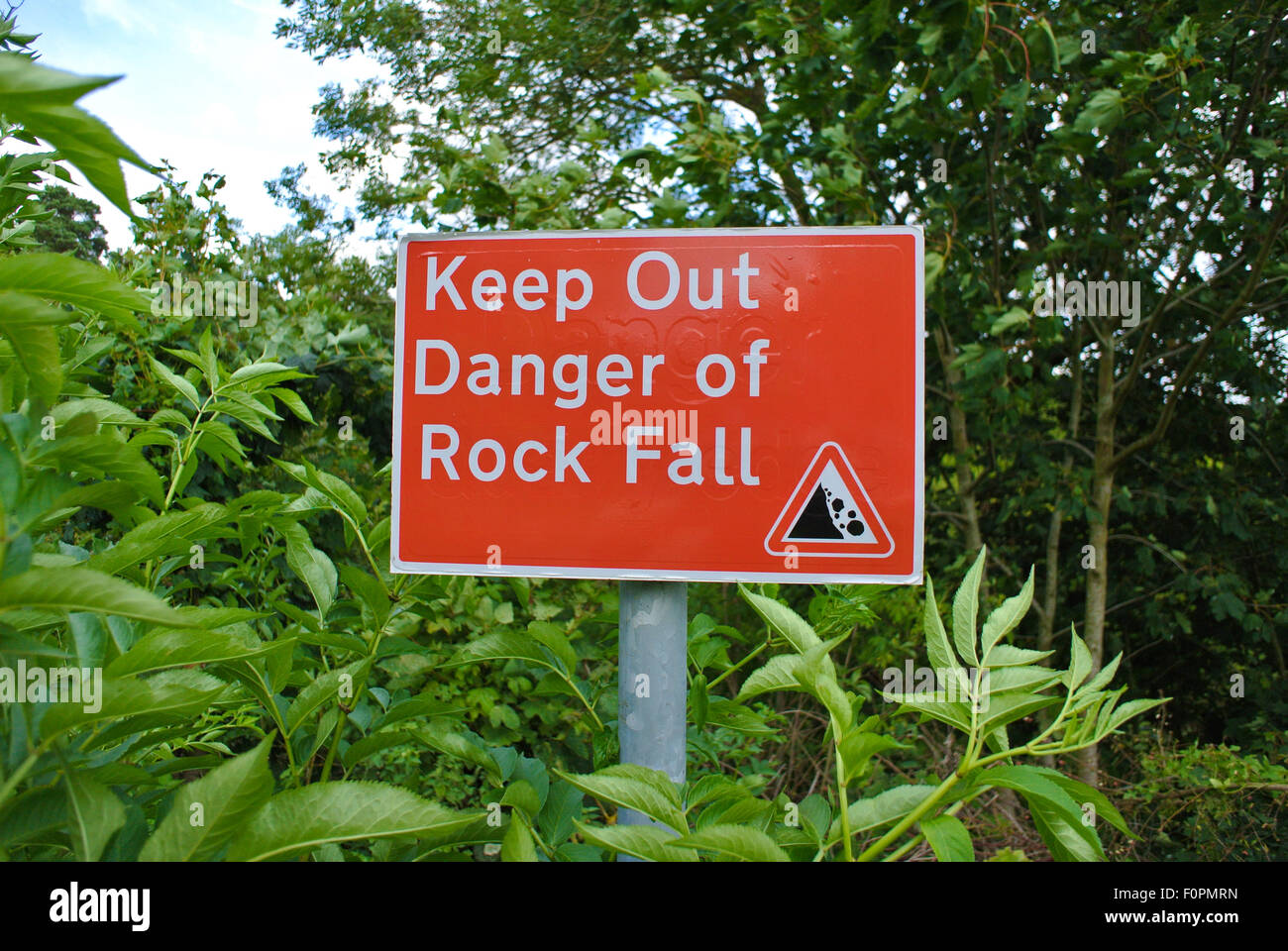 Danger sign rock fall Stock Photo - Alamy