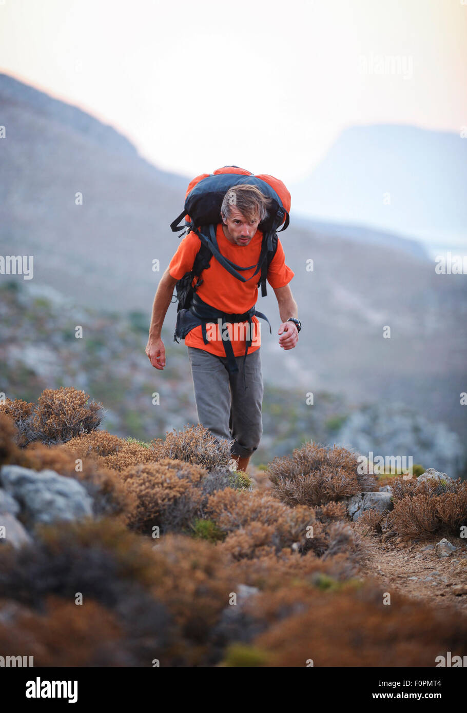 Male hiker in mountains Stock Photo - Alamy