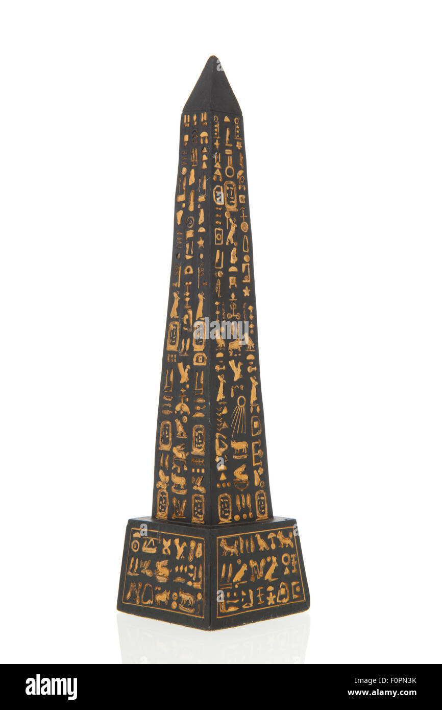 Egyptian obelisk with many signs isolated over white background Stock ...