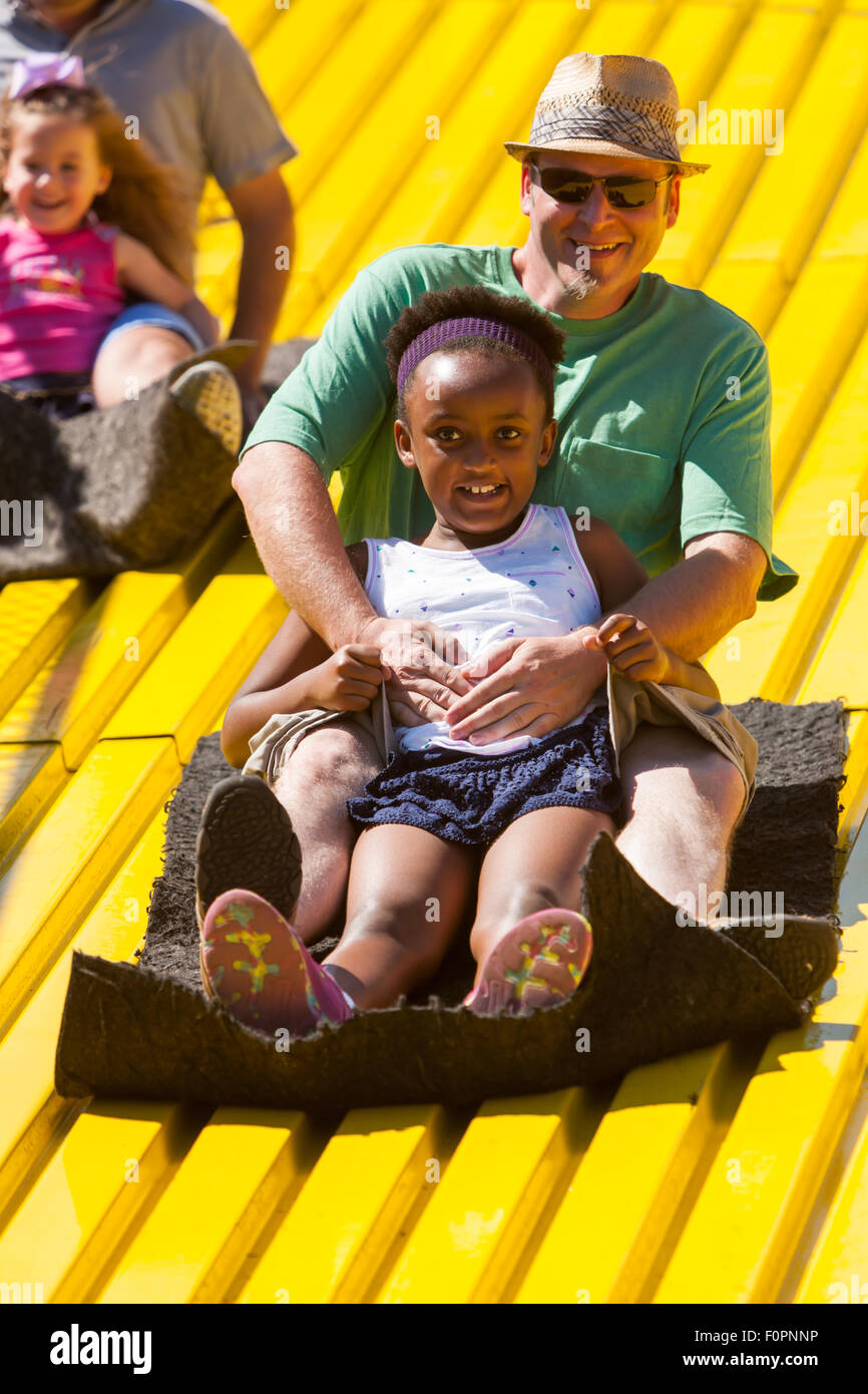 People enjoy a ride down the Giant Slide at the Ohio State Fair in ...