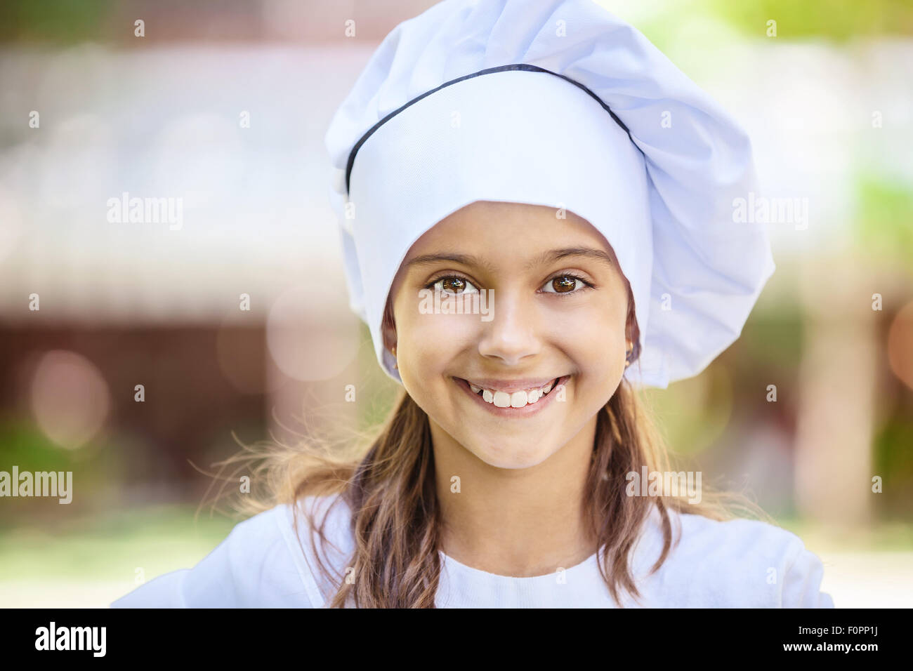 Girl chef hat hi-res stock photography and images - Alamy
