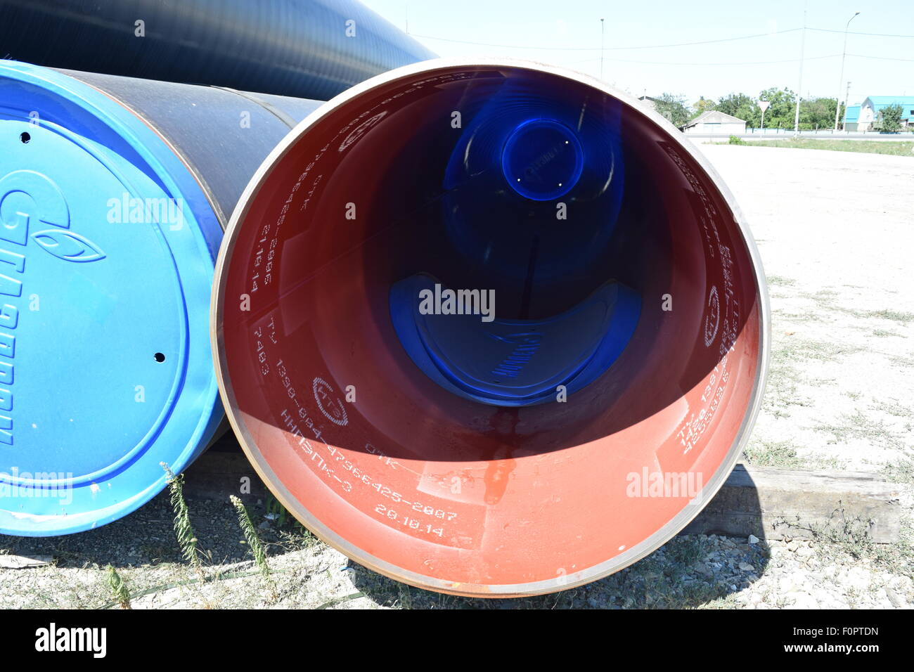 The gas pipeline, pipes prior to assembly. A warehouse of pipes before ...