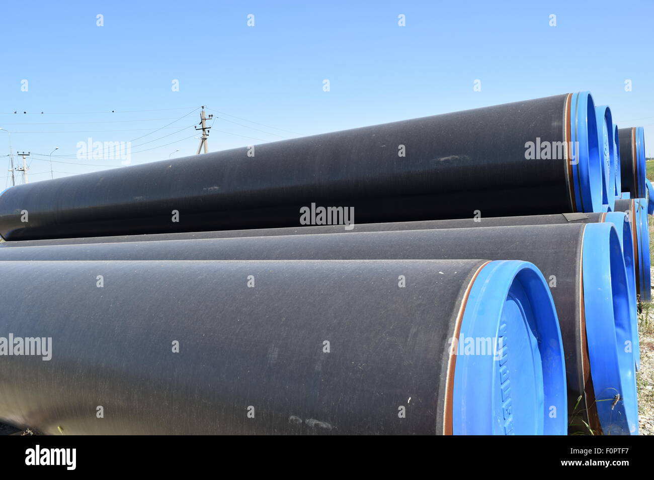 The gas pipeline, pipes prior to assembly. A warehouse of pipes before ...