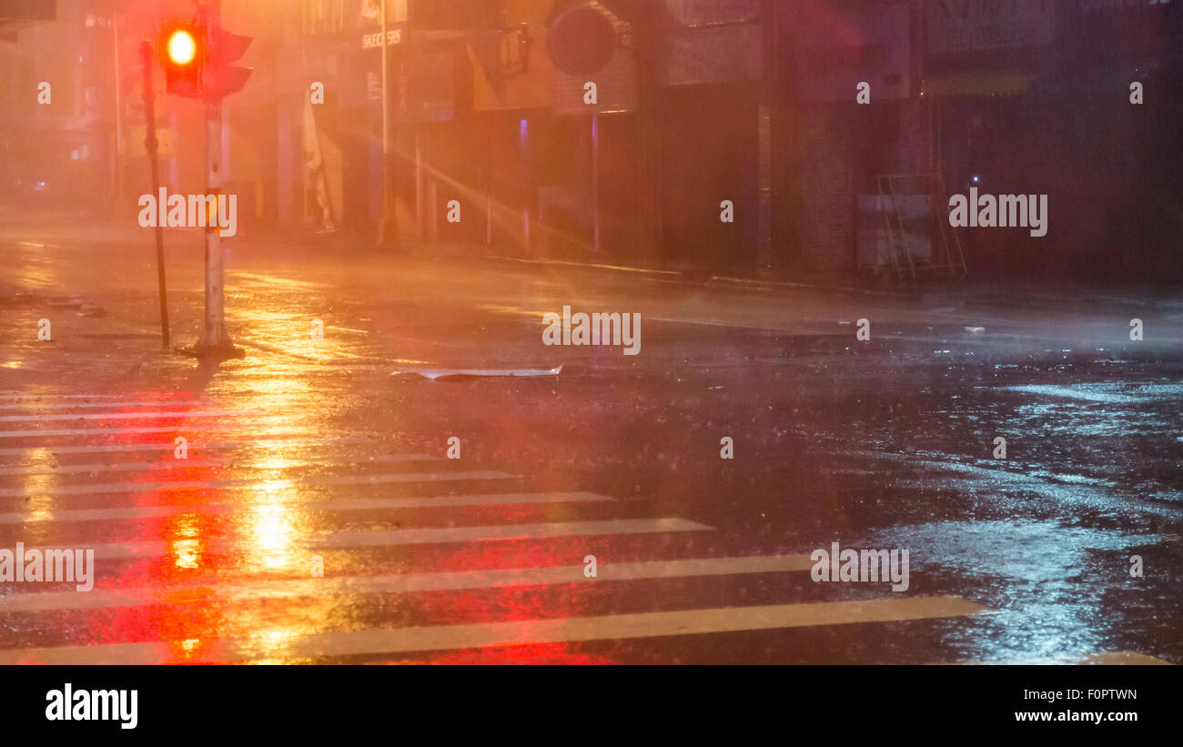 Heavy rain pouring on city street during typhoon Souledor Stock Photo ...