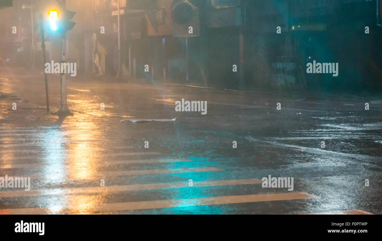 Heavy rain pouring on city street during typhoon Souledor Stock Photo ...
