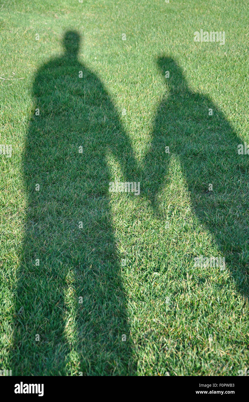 shadow of couple holding hands, UK Stock Photo - Alamy