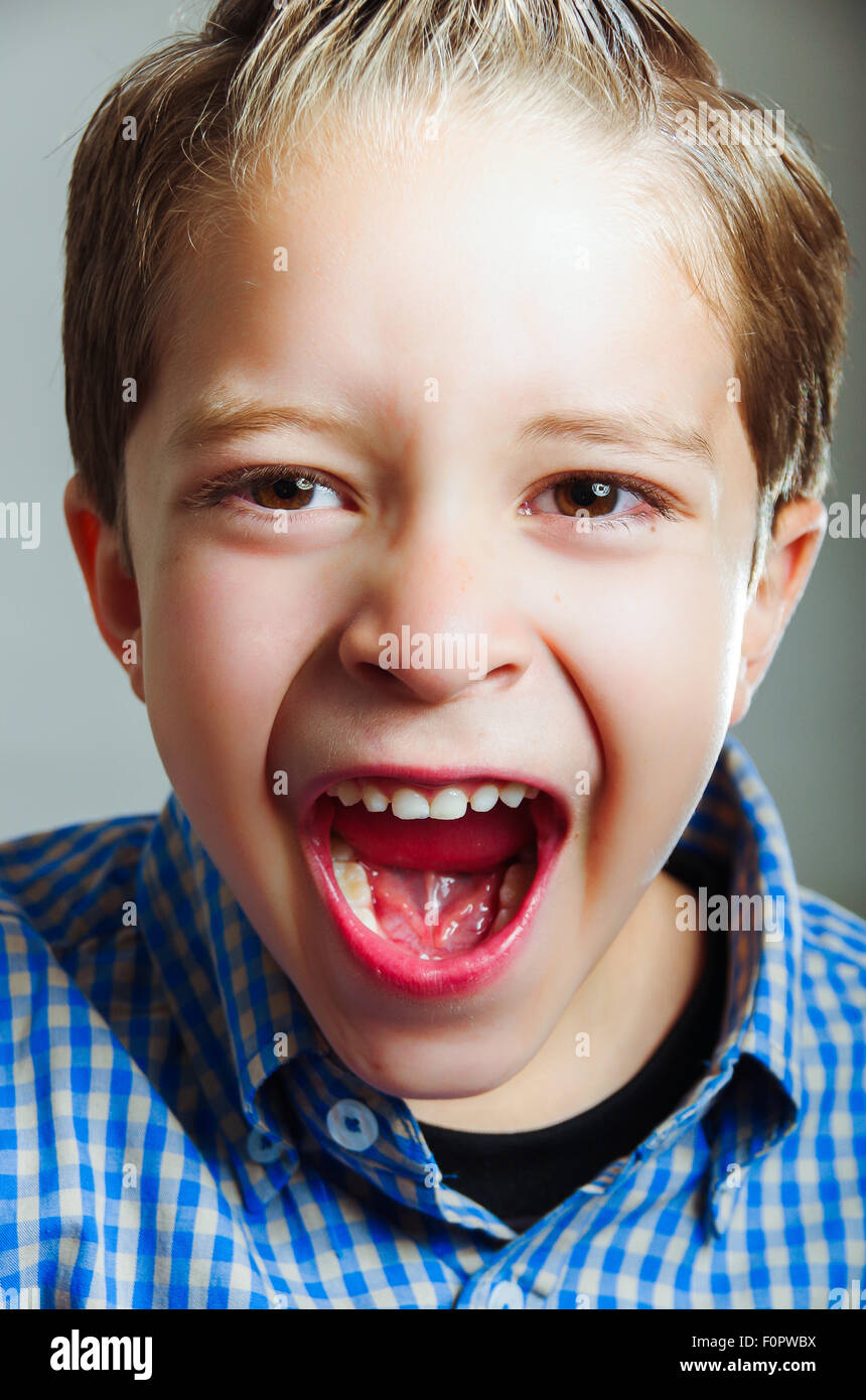 Cute little boy screaming Stock Photo - Alamy