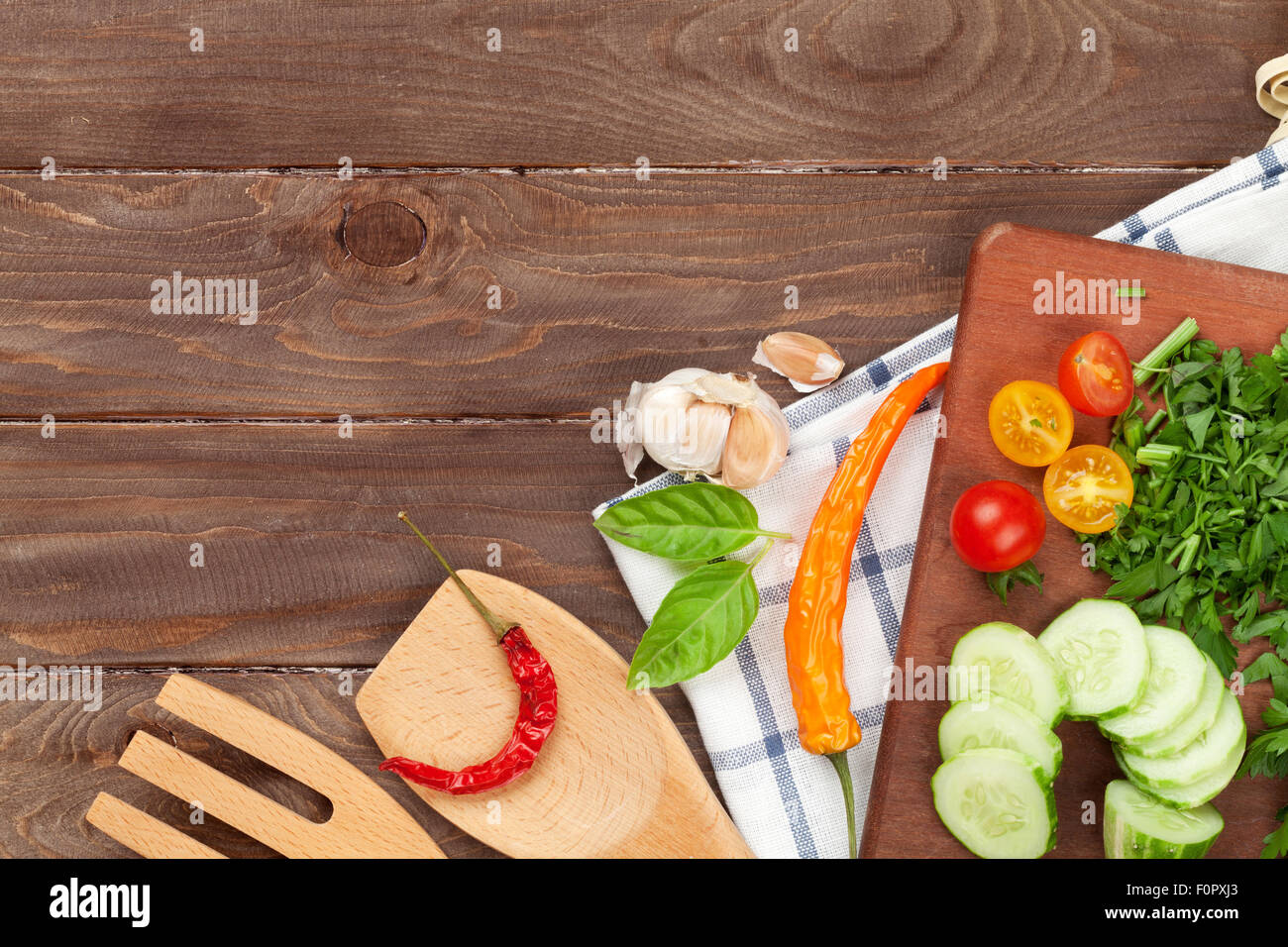 Cooking ingredients and utensils on wooden table. Top view with copy ...