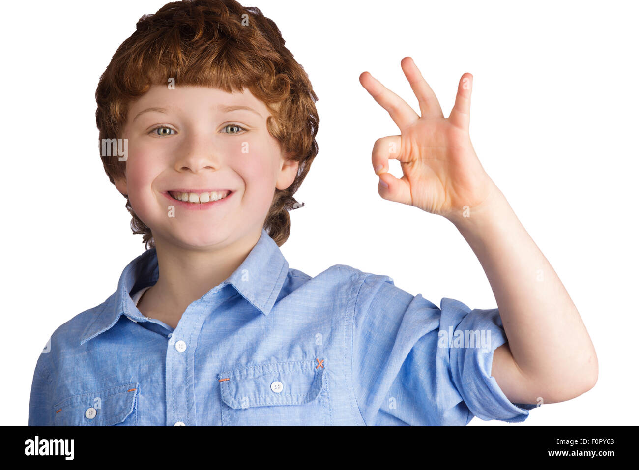Handsome smiling boy showing OK sign with his hand. Isolated on white ...