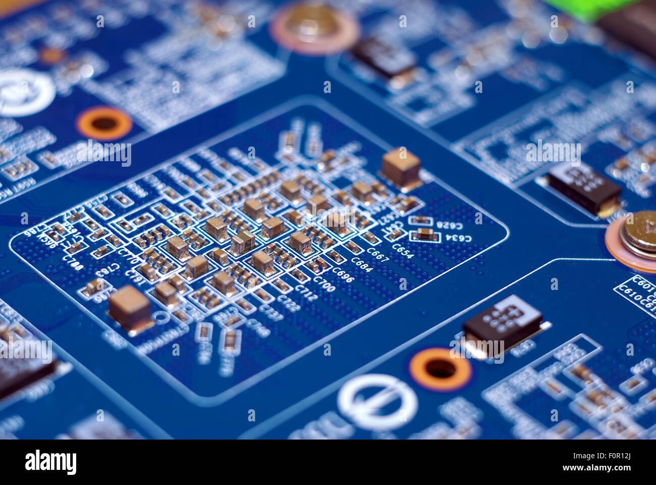 Blue electronic plate. PC device Stock Photo - Alamy