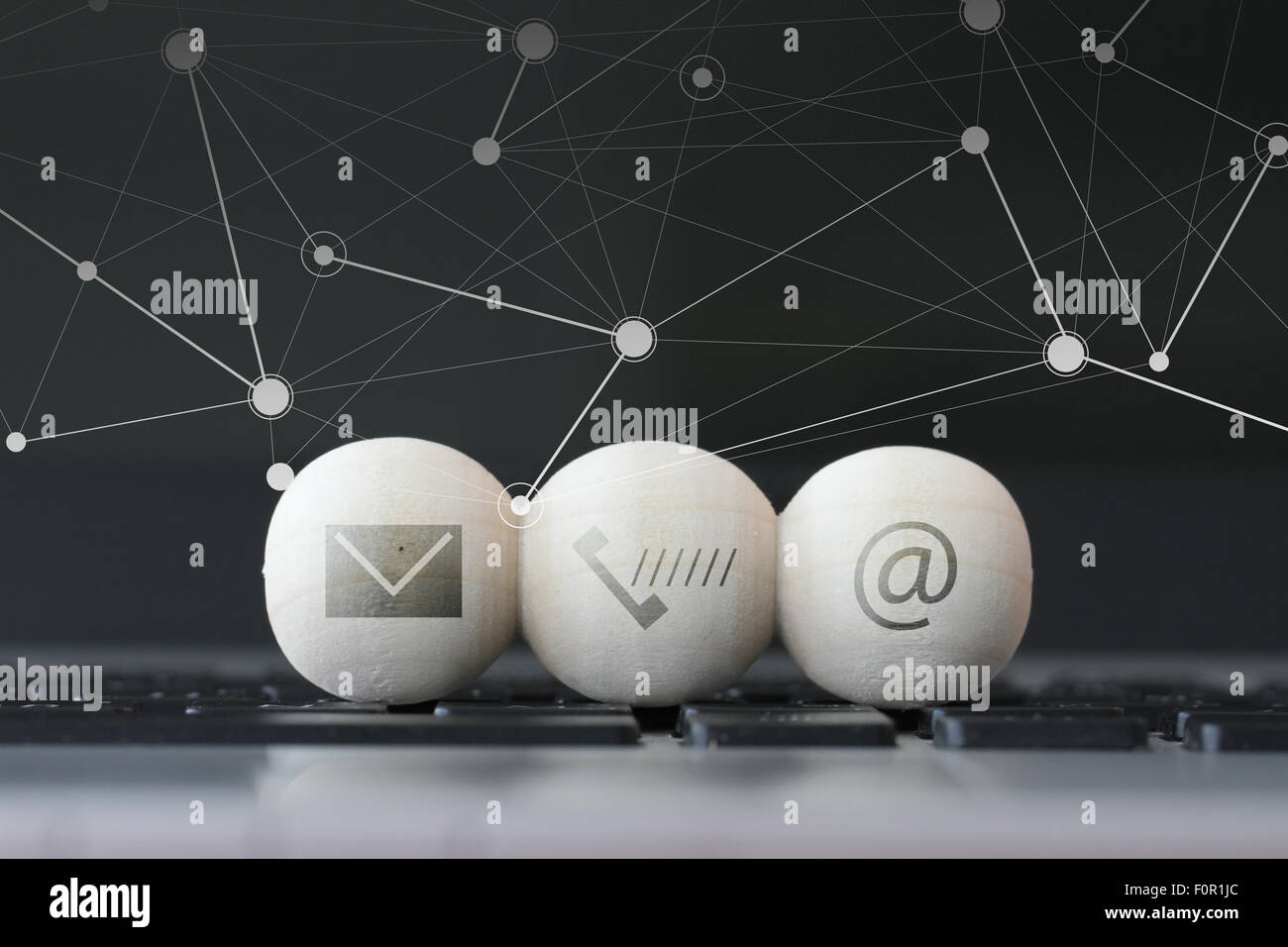 icon on wooden ball of website and internet contact us page concept on ...