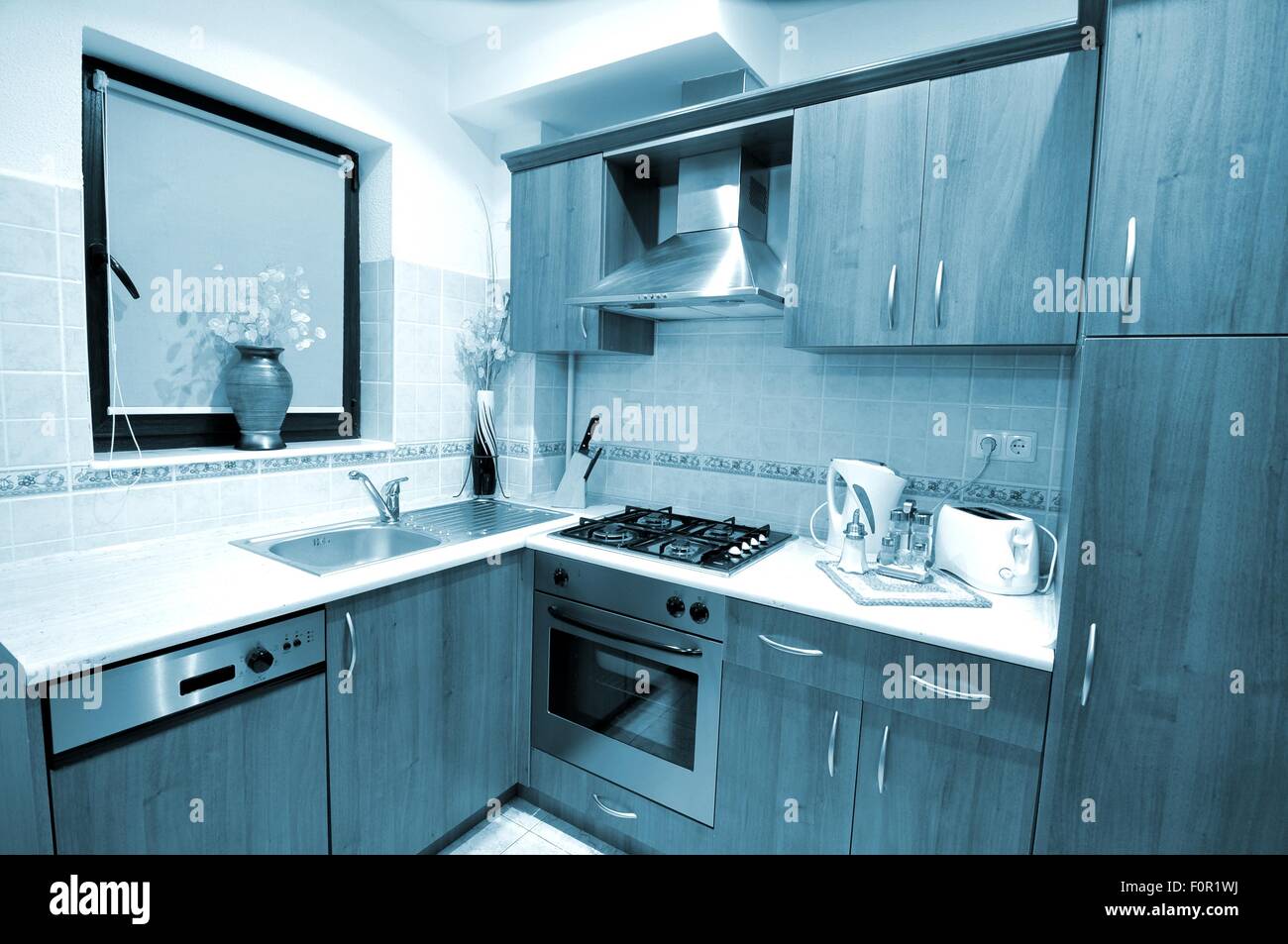 Wide angle view of modern kitchen Stock Photo - Alamy