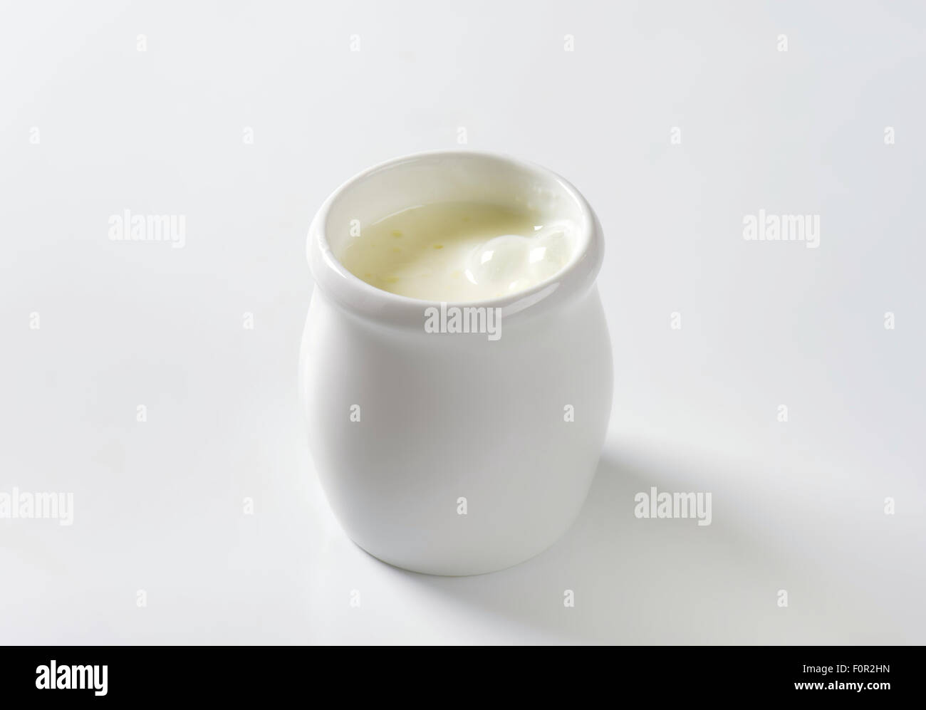 cup of milk on white background Stock Photo - Alamy