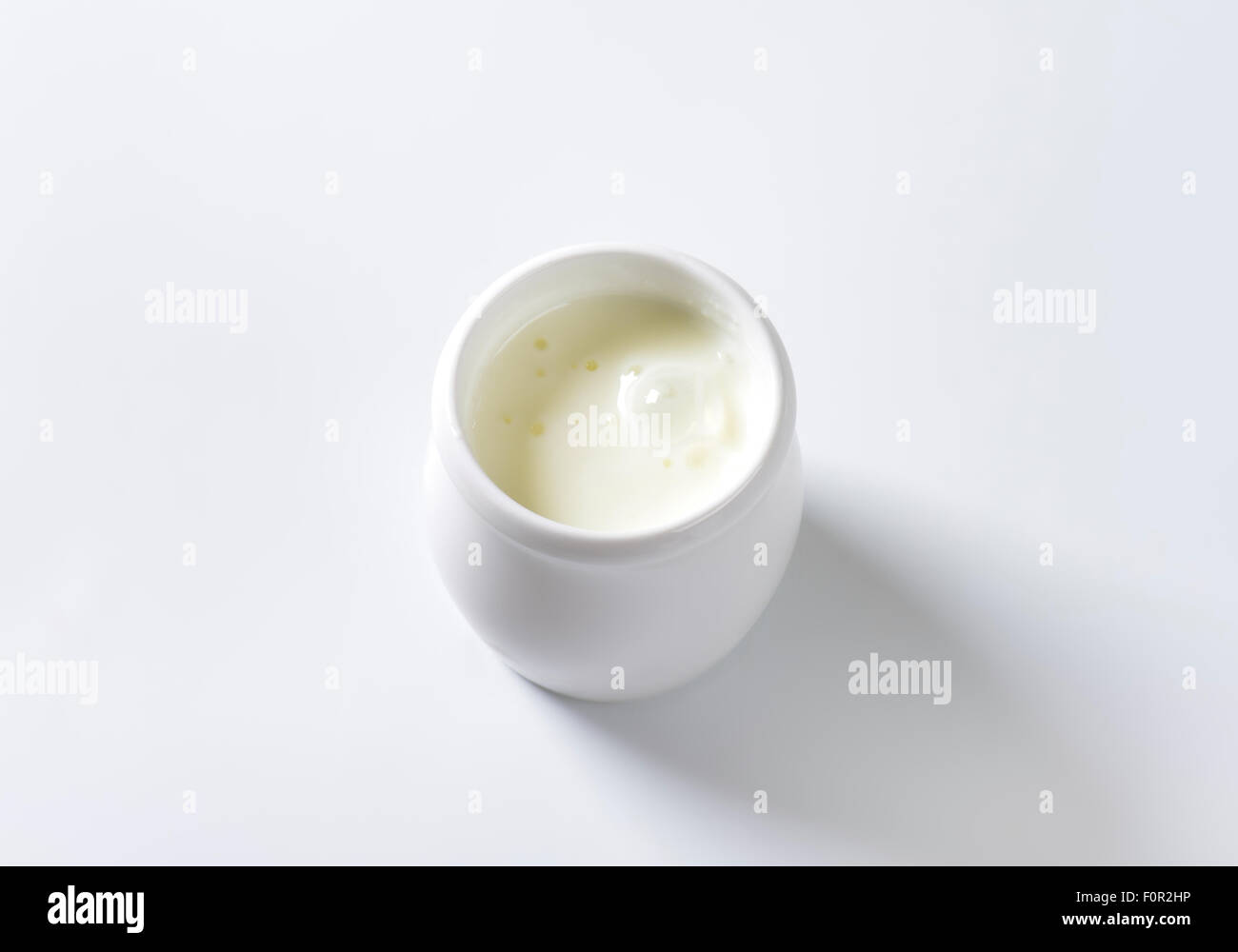 cup of milk kefir on white background Stock Photo - Alamy