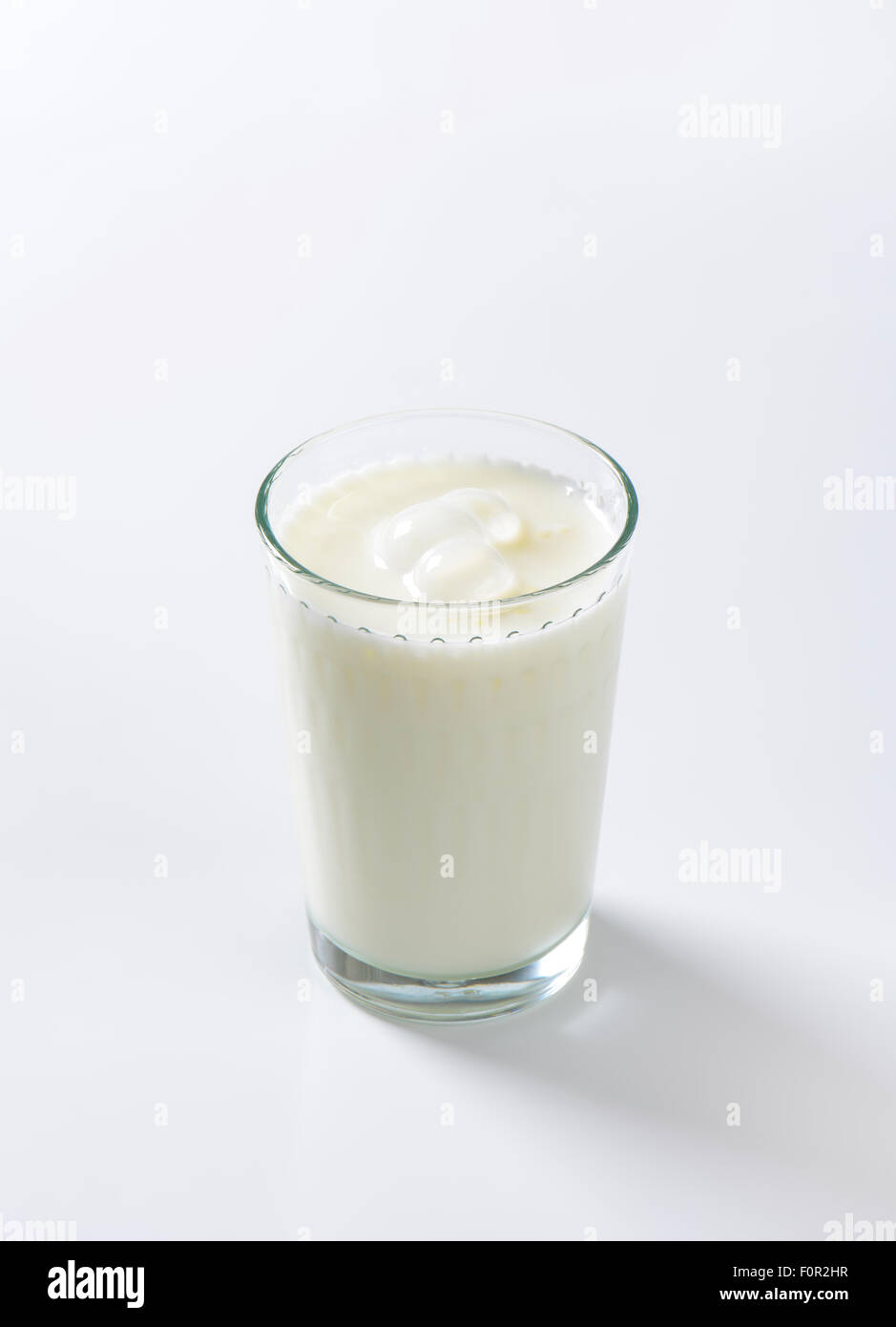glass of milk on white background Stock Photo - Alamy