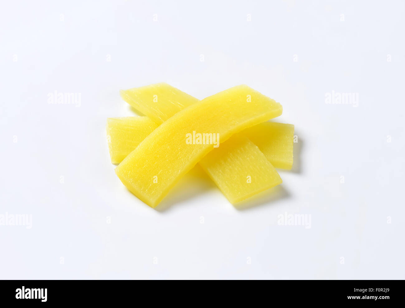 bamboo shoot slices on white background Stock Photo - Alamy