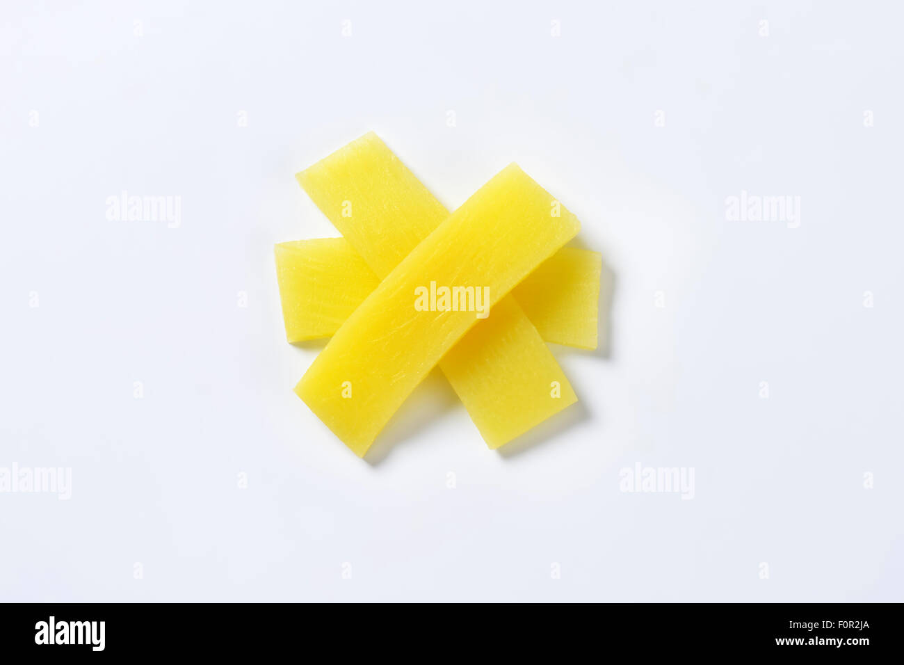 bamboo shoot slices on white background Stock Photo - Alamy