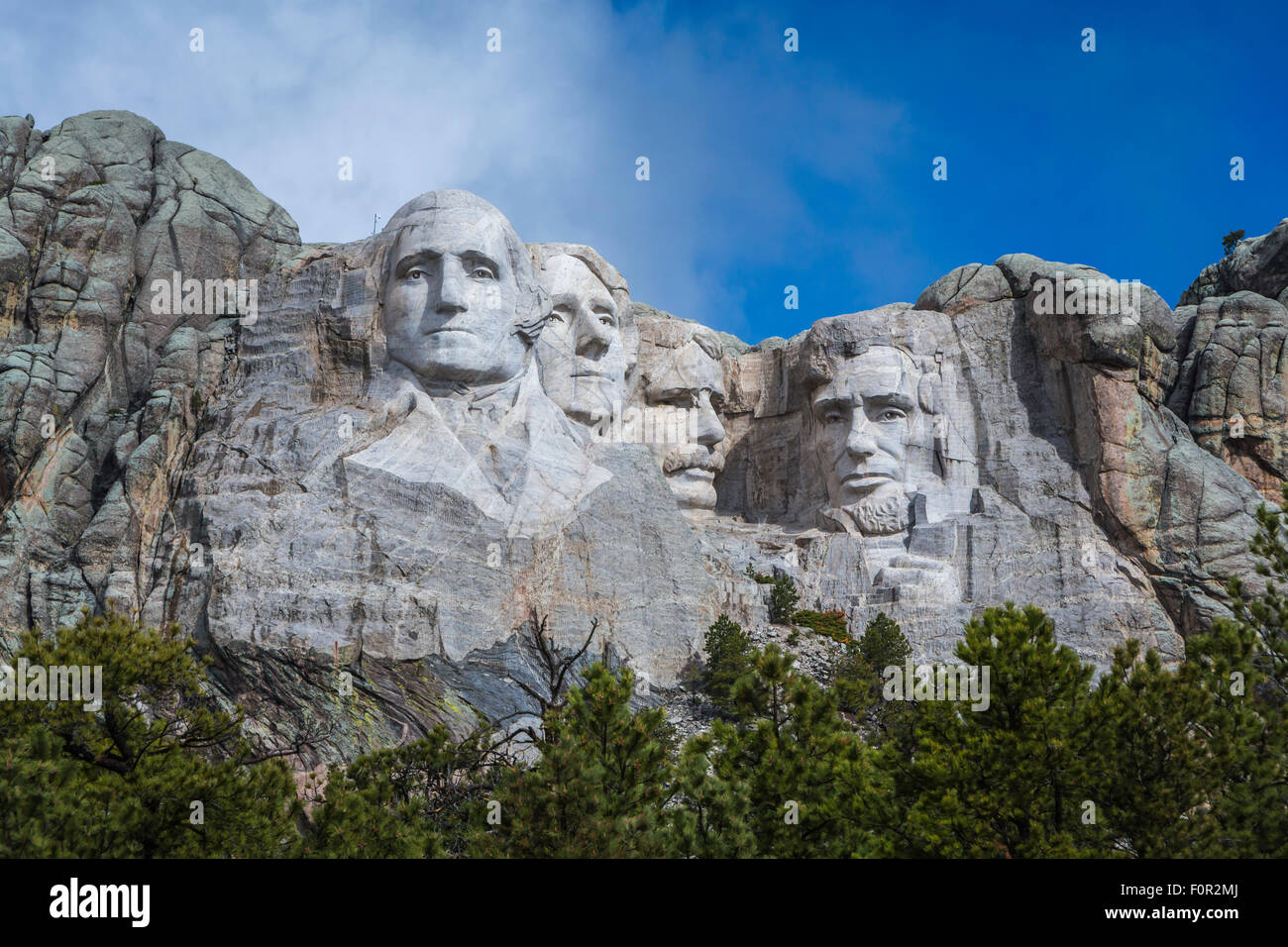 Mount Rushmore National Memorial is a sculpture carved into the granite ...