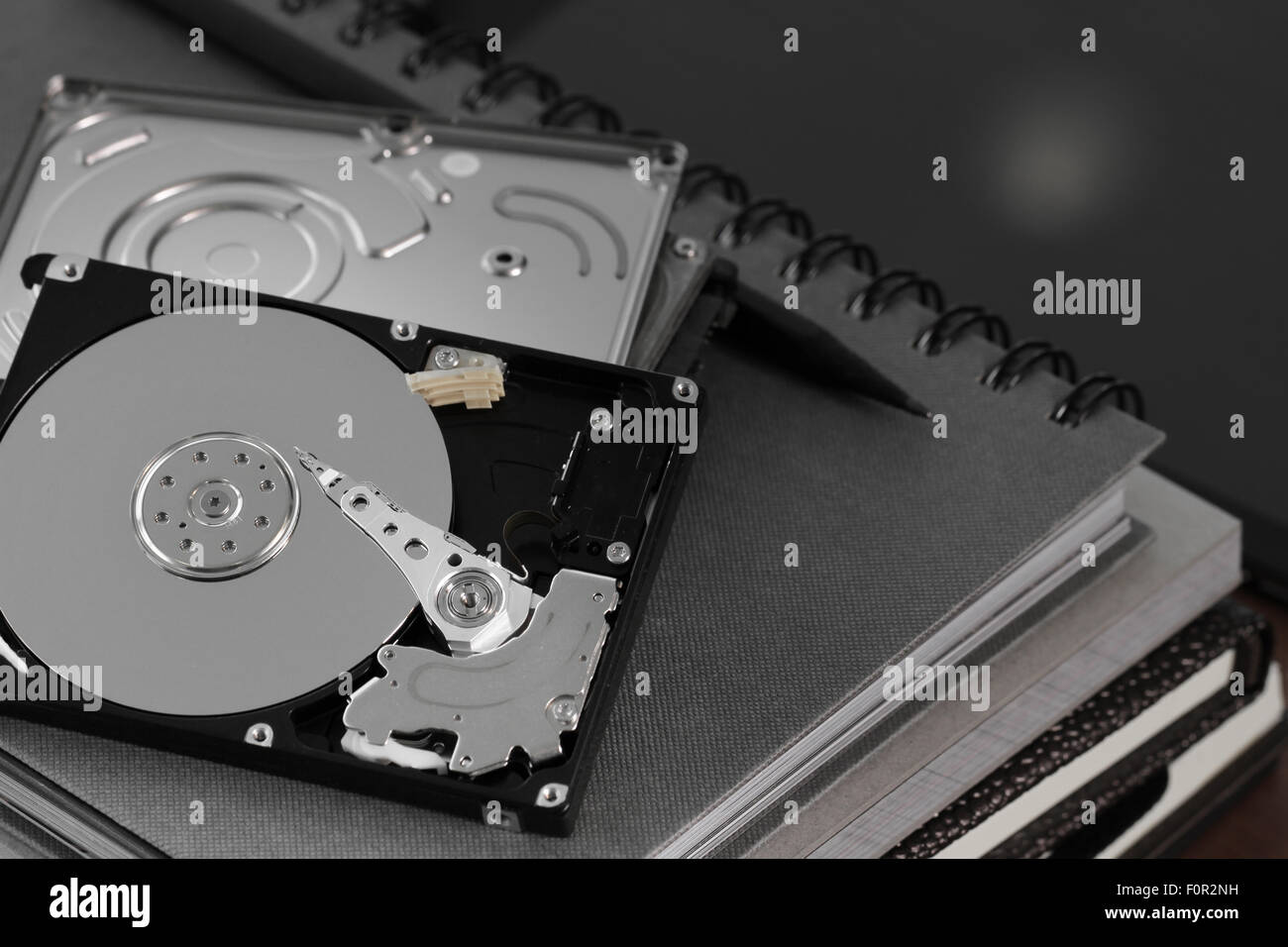 Close up of open computer hard disk drive with social network diagram ...