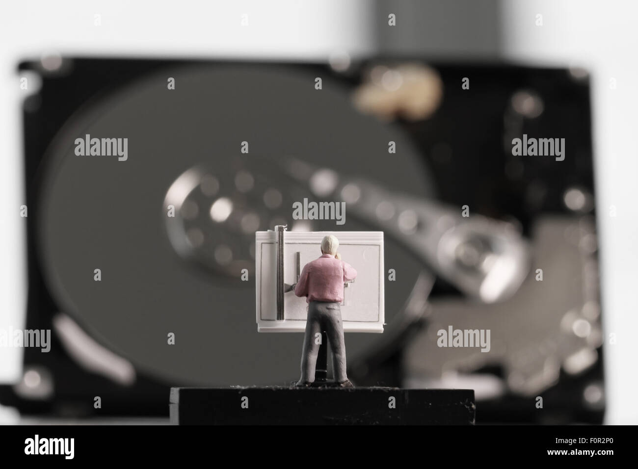 Close up of open computer hard disk drive with social network diagram ...