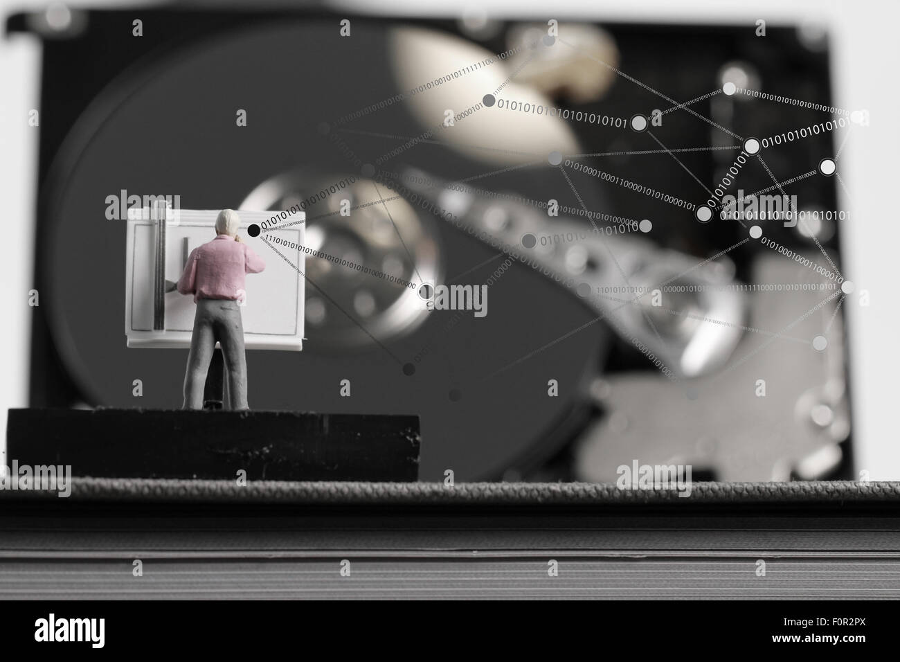 Close up of open computer hard disk drive with social network diagram ...
