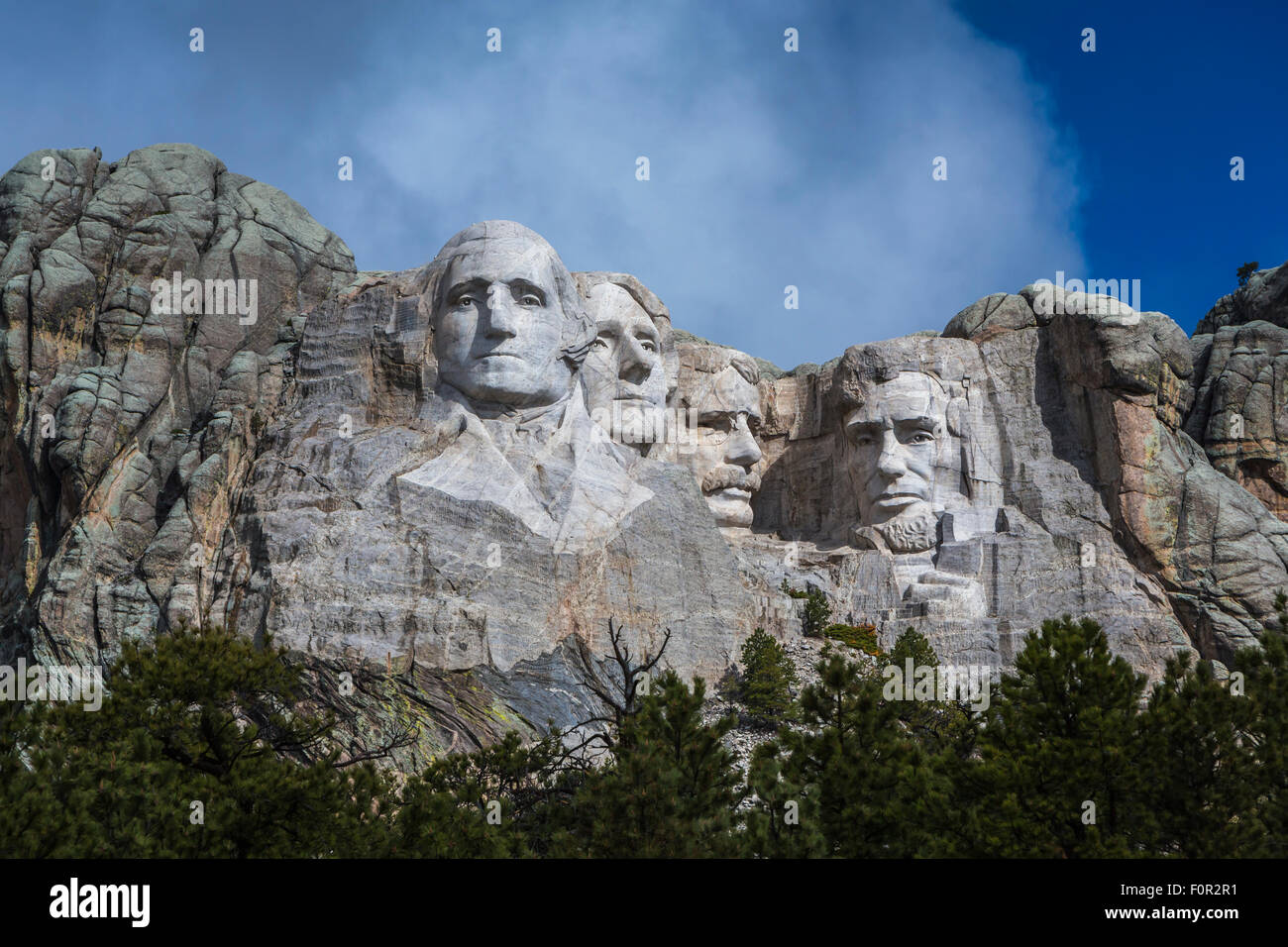 Mount Rushmore National Memorial is a sculpture carved into the granite ...