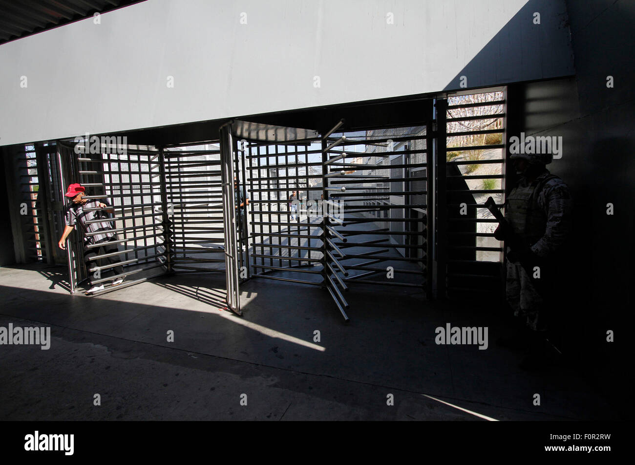 Tijuana, Mexico. 19th Aug, 2015. A security member stands guard during ...