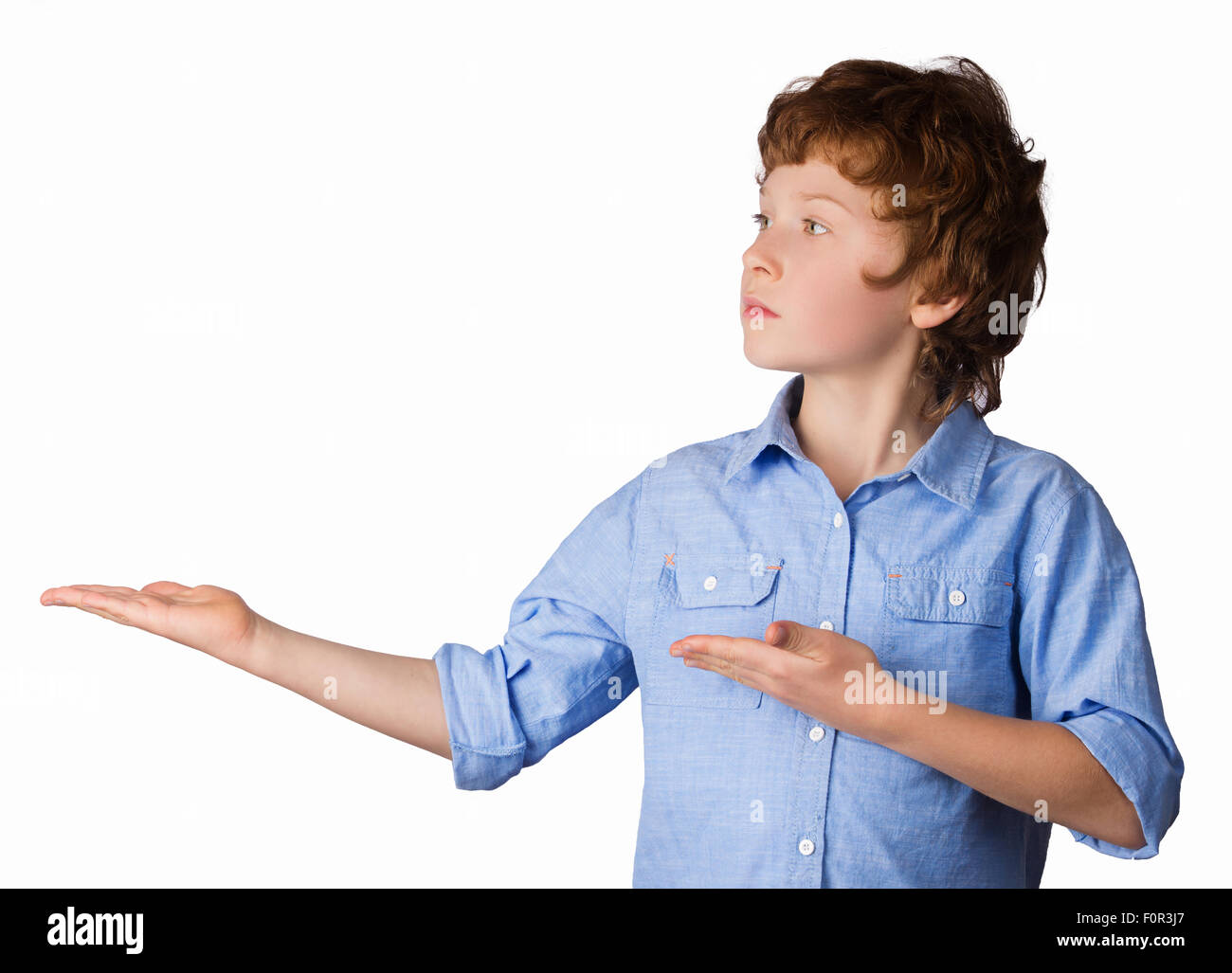 Handsome boy points with his hands. Isolated on white background Stock ...
