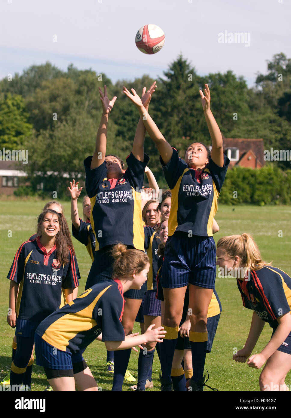 Girls playing rugby hi-res stock photography and images - Alamy