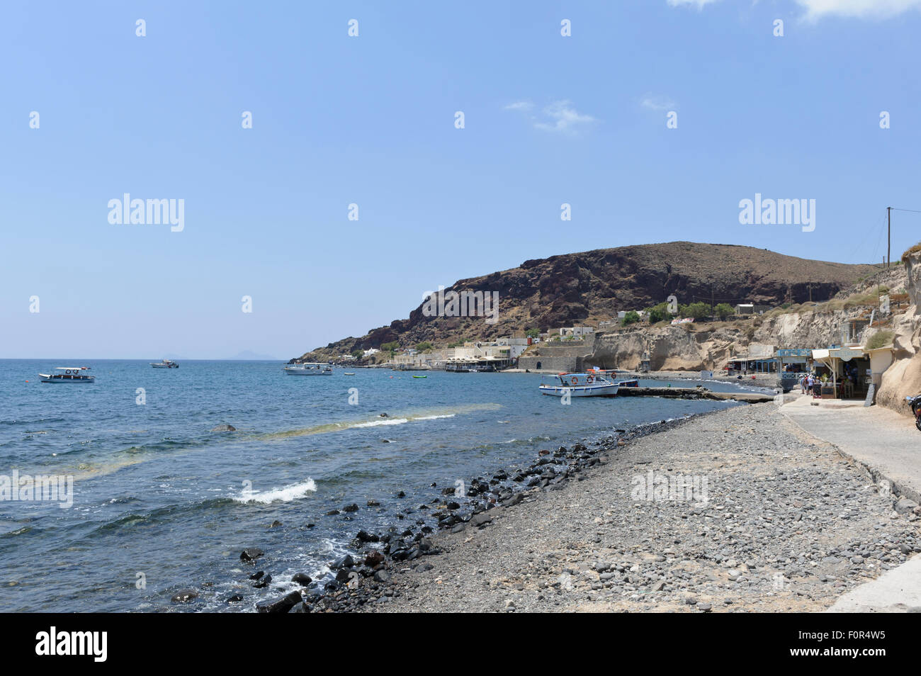 Akrotiri beach with pebbles and rocks, Santorini, Greece Stock Photo ...