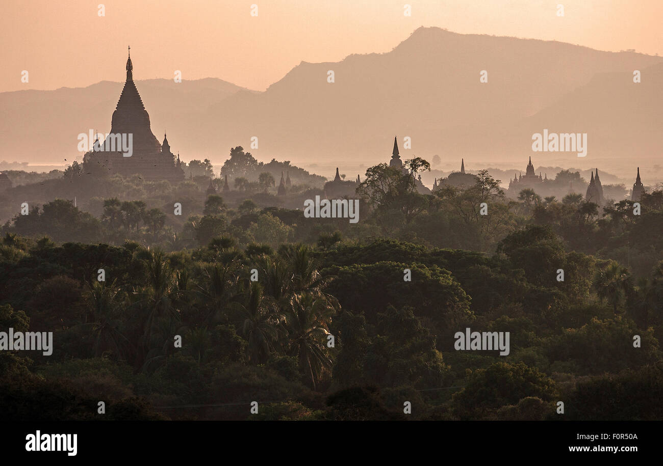 View of pagodas, temples, pagodas field, backlit, evening light, Bagan ...