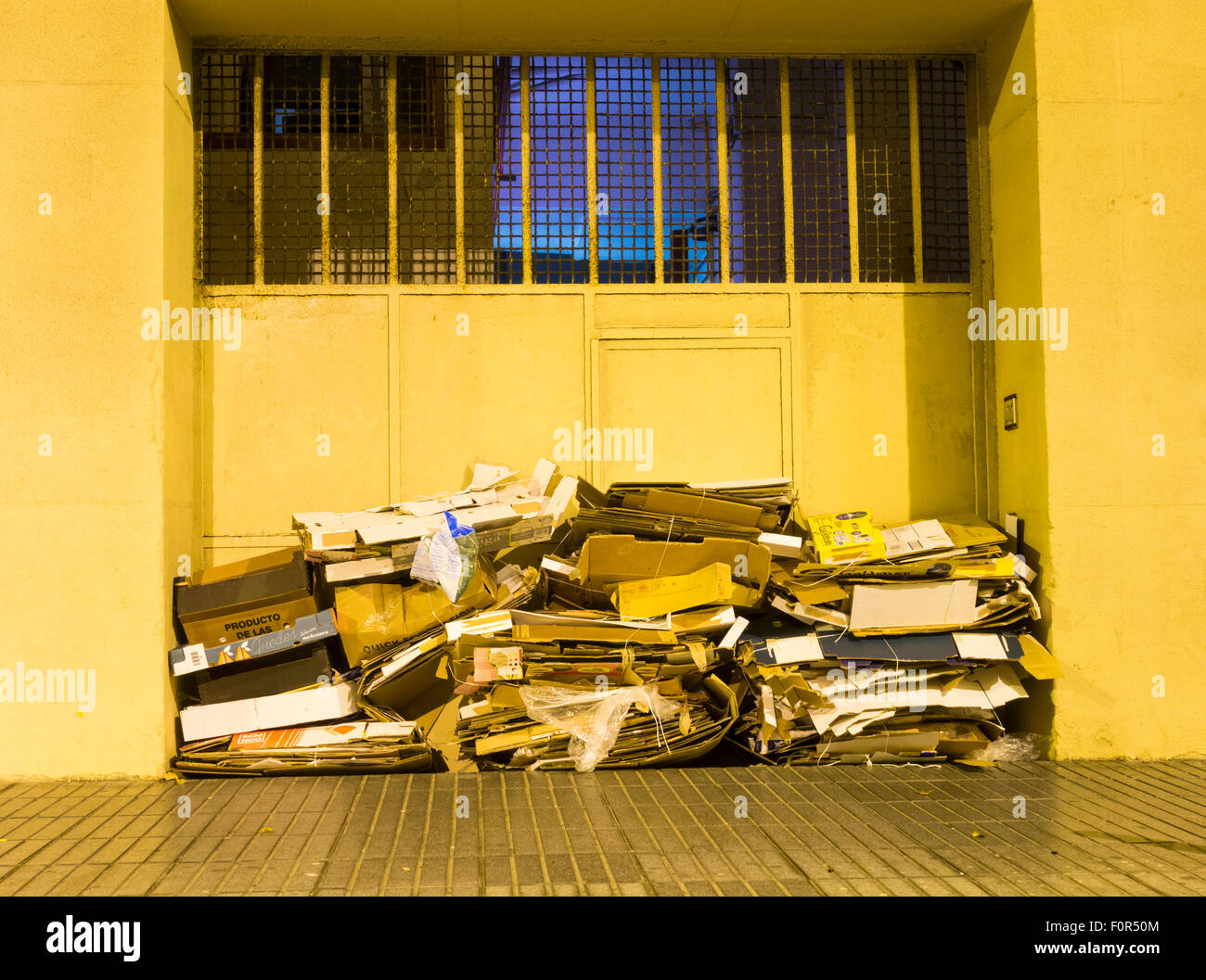 Cardboard waste ready for collection outside business premises in Spain ...